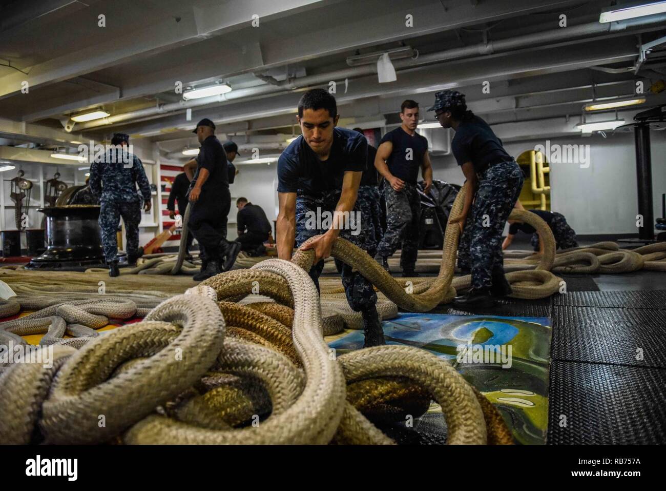 SAN DIEGO (Dec. 8, 2016) Sailors fake down a line during a pier shift ...