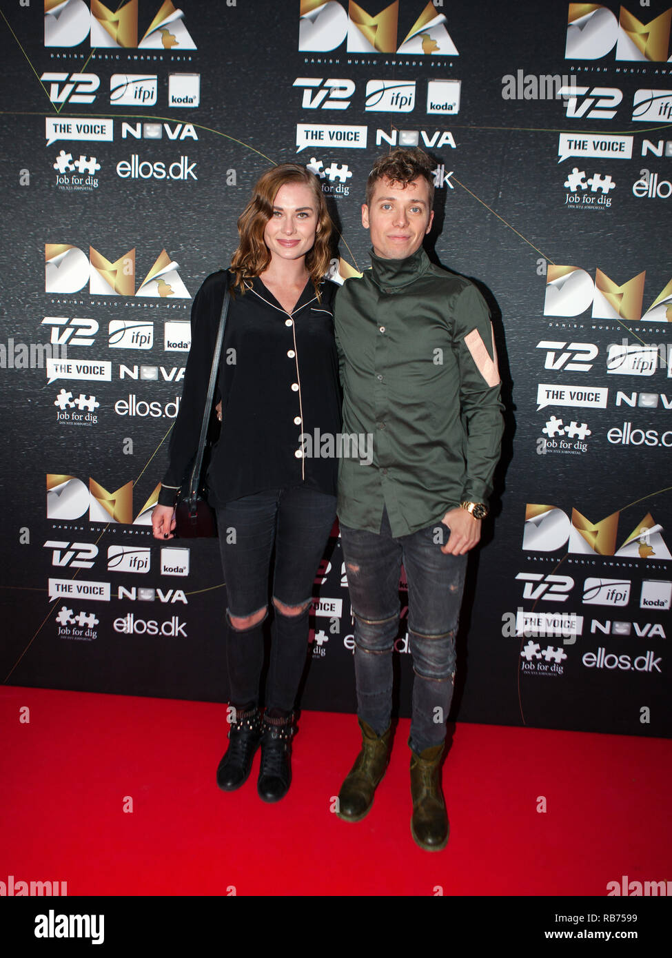 The Danish singer and songwriter Mads Langer (R) arrives with Julie ...