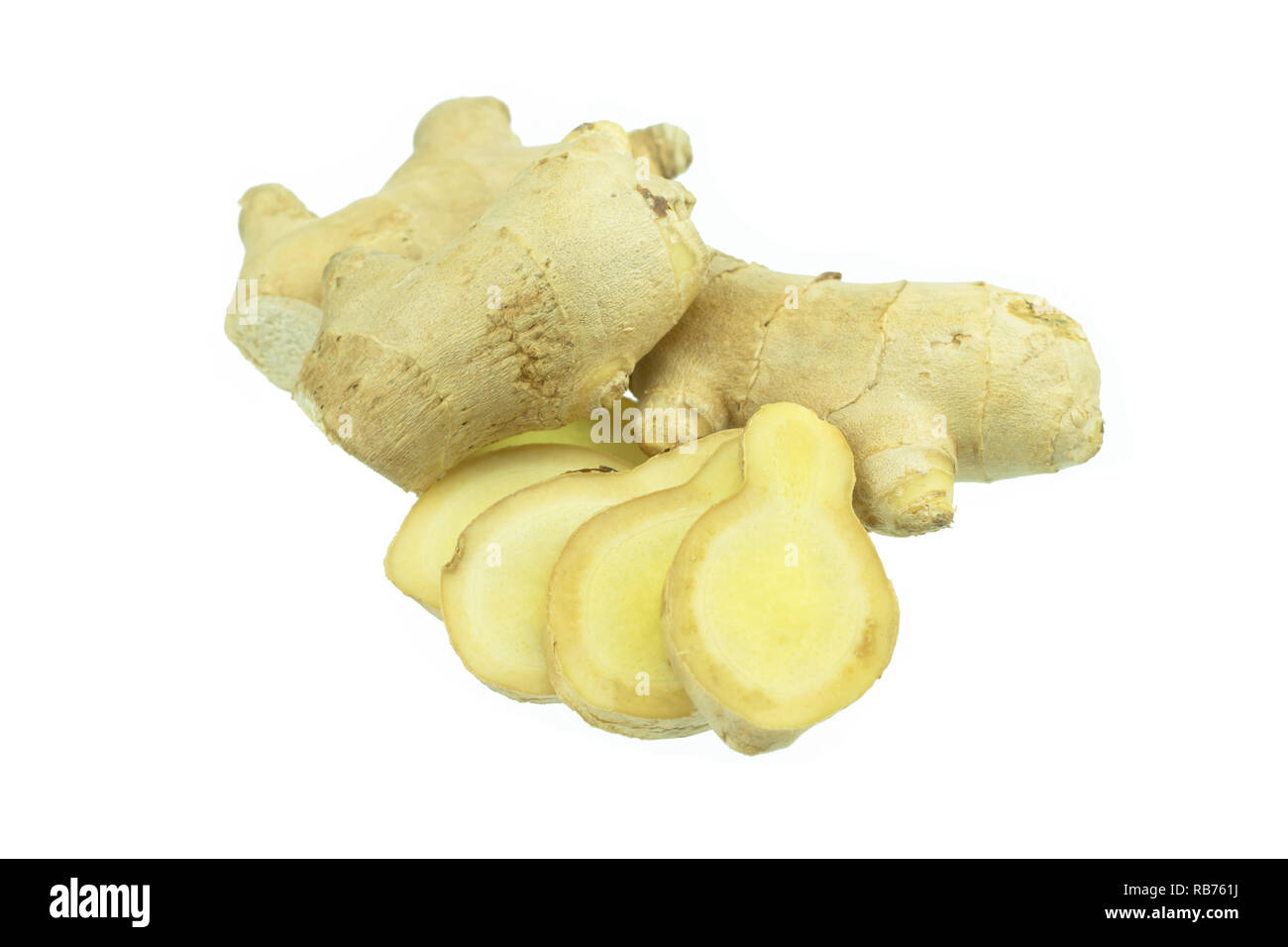 slices of fresh ginger and heap isolated on white background Stock ...