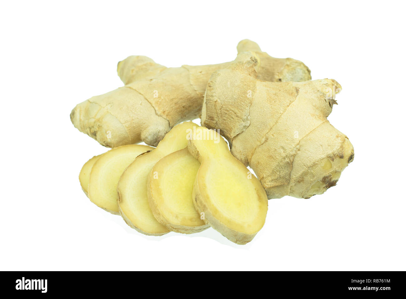 slices of fresh ginger and heap isolated on white background Stock ...