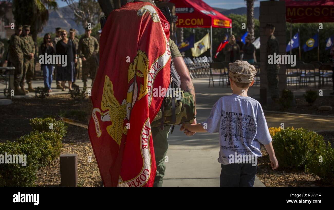 Jon Hancock and his son walk to the parade deck in Marine Corps Base ...