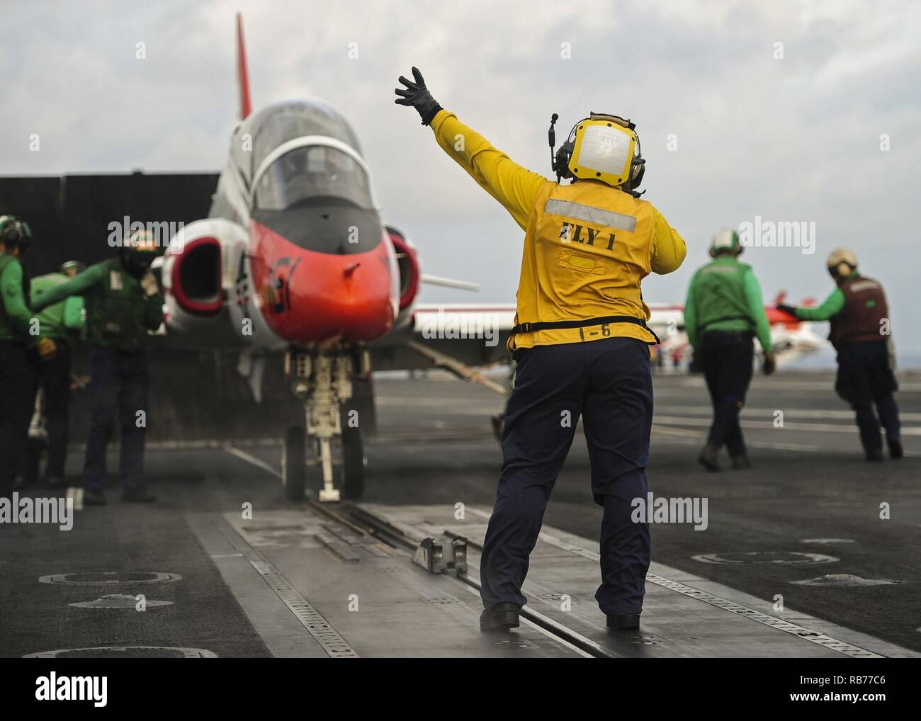 ATLANTIC OCEAN (Dec. 12, 2016) A Sailor directs an T-45C Goshawk from ...