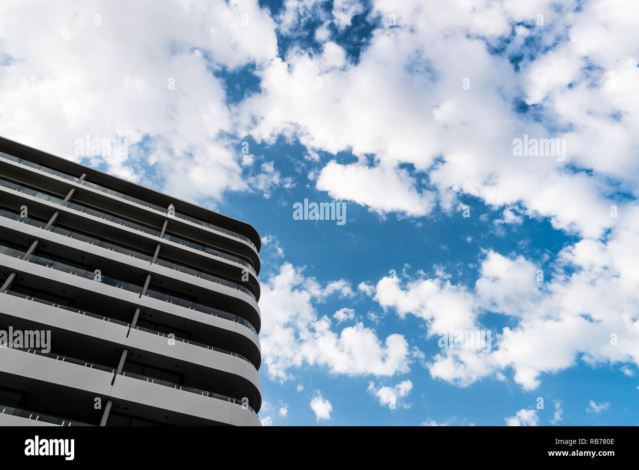 modern building, blue sky and clouds Stock Photo - Alamy