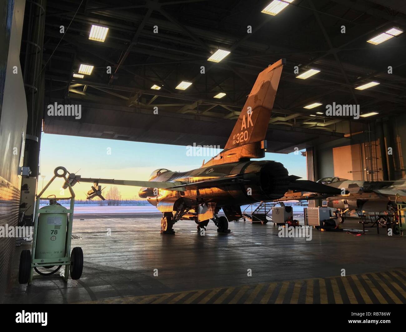 A U.S. Air Force F-16 Fighting Falcon aircraft is prepared for a ...