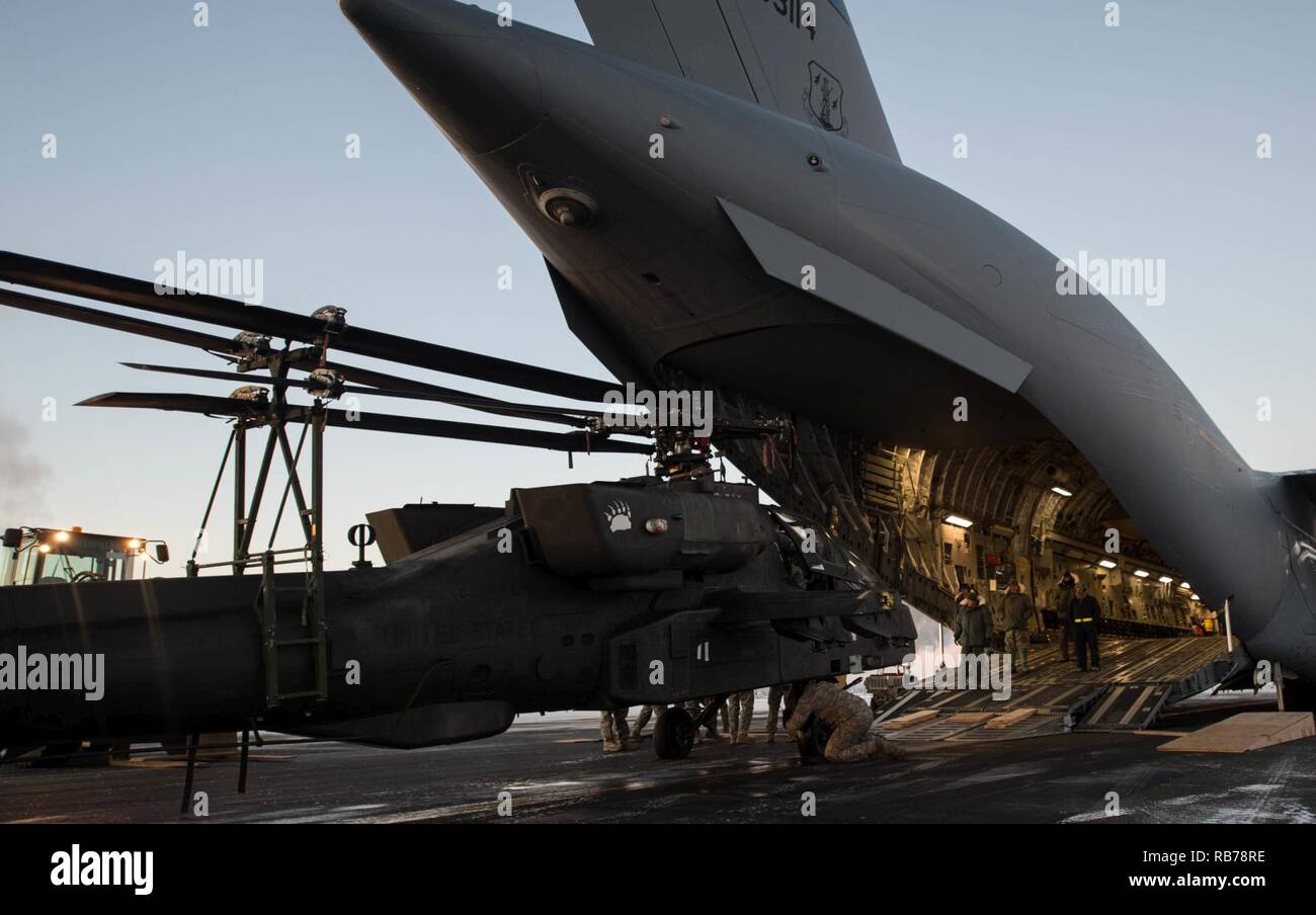 An AH-64 Apache helicopter from the 1st Attack Reconnaissance Battalion ...