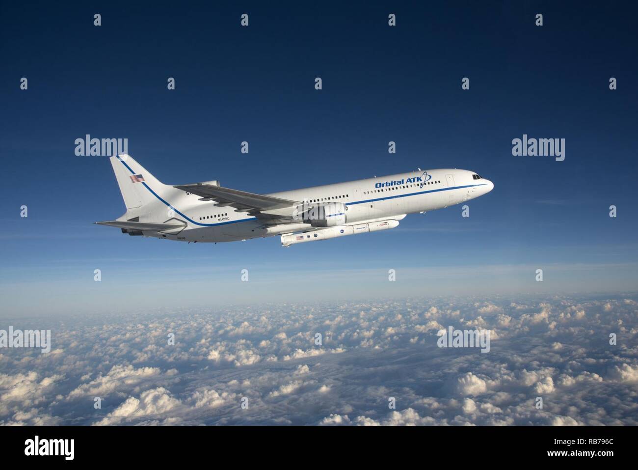 The Orbital ATK L-1011 Stargazer aircraft flies over the Atlantic Ocean ...