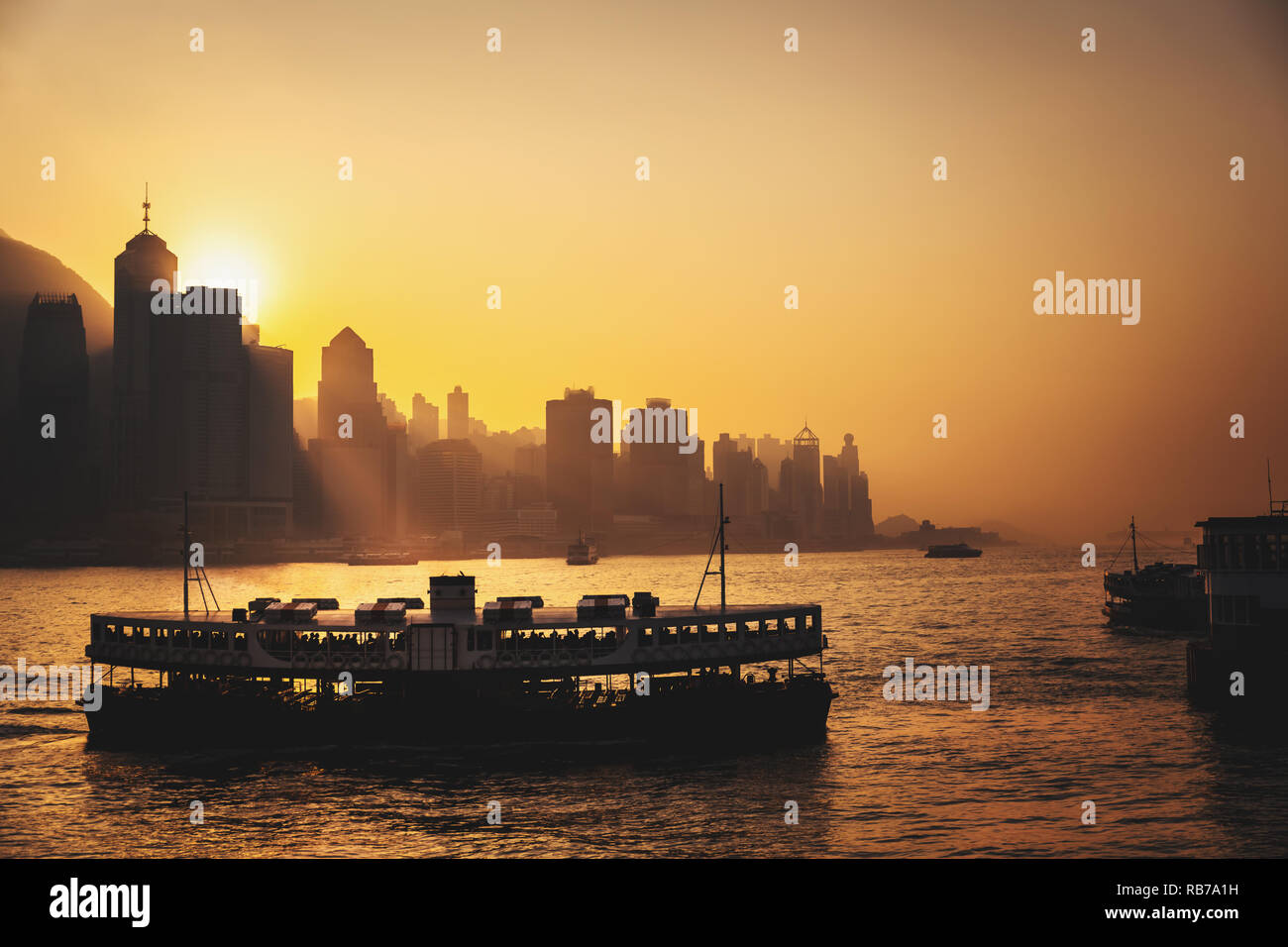 Hong Kong Victoria Harbour view with sunset Stock Photo - Alamy