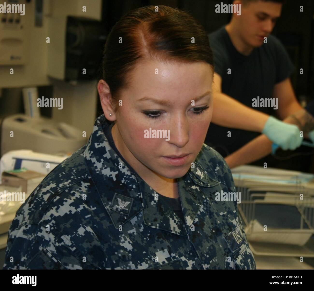 Petty Officer 3rd Class Kayla Kirk, assists with hospital corpsmen ...