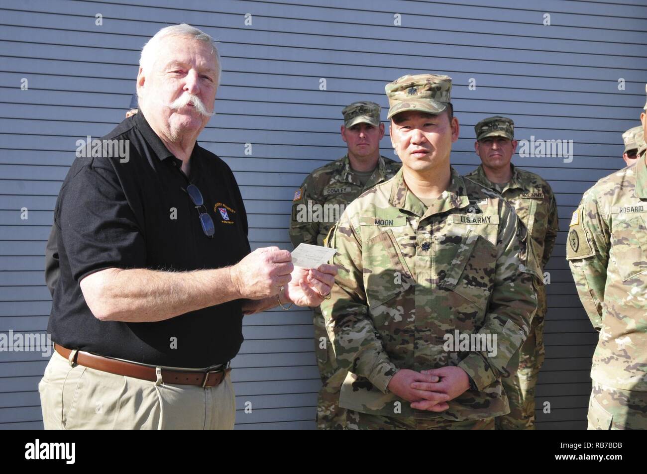 Lawrence Van Kuran, president of the 18th Infantry Regiment Association ...
