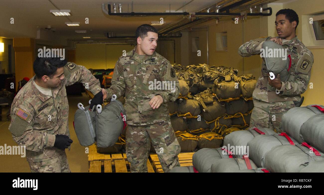 U.S. Army parachute riggers assigned to 601st Quartermaster Company ...