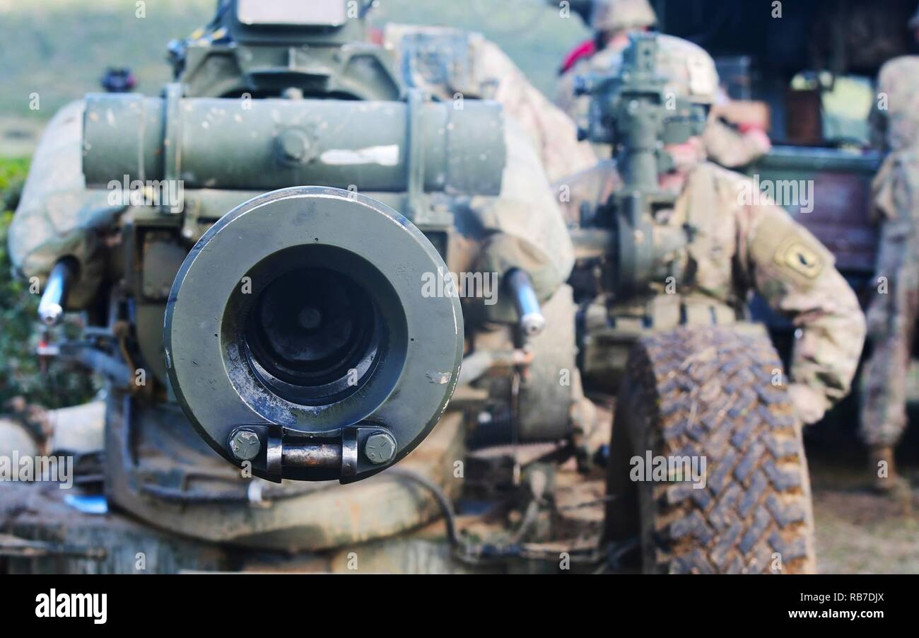 U.S. Army Spc. Stephen Sevigny, a gunner assigned to 4th Battalion ...