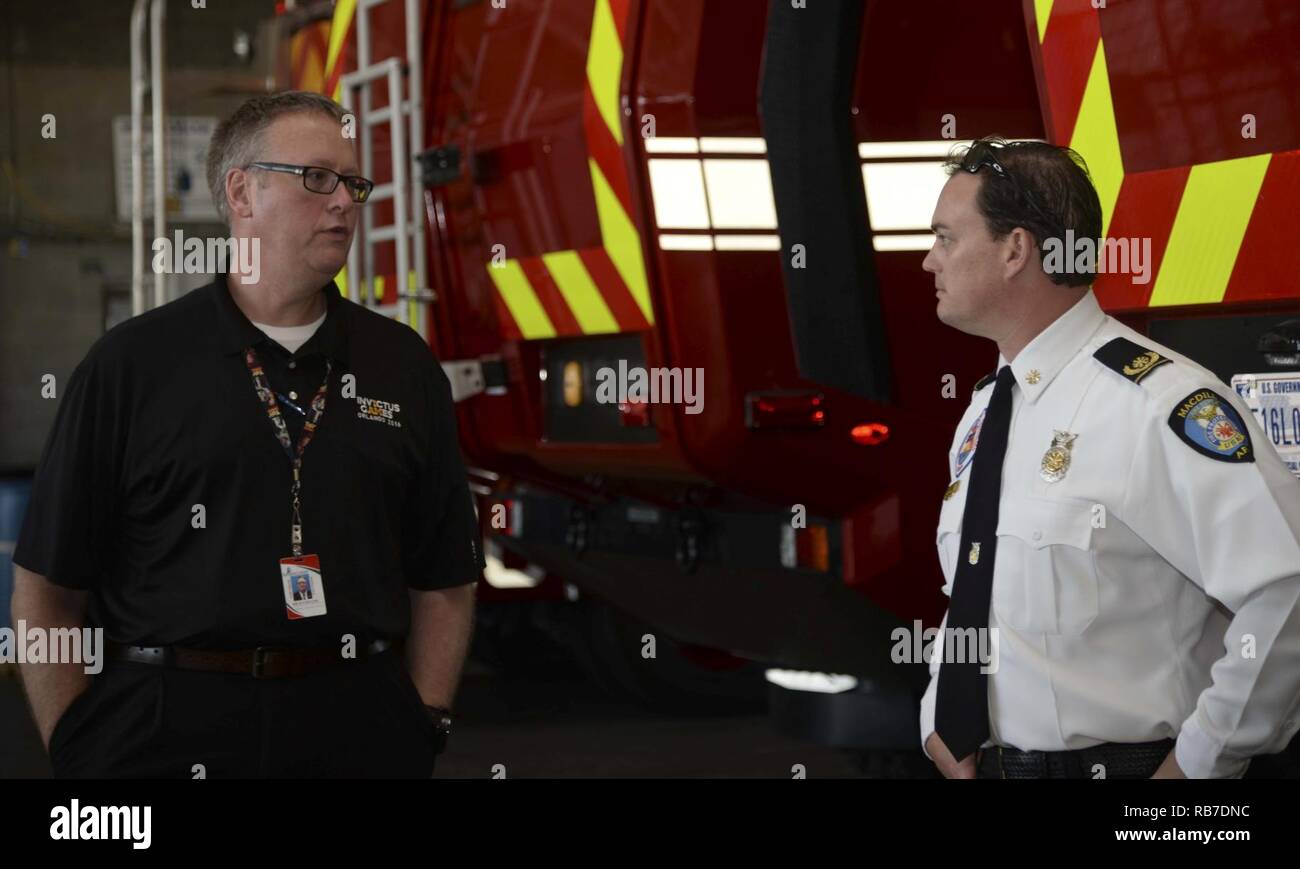 Richard Collins, left, the Sarasota County Emergency Services ...