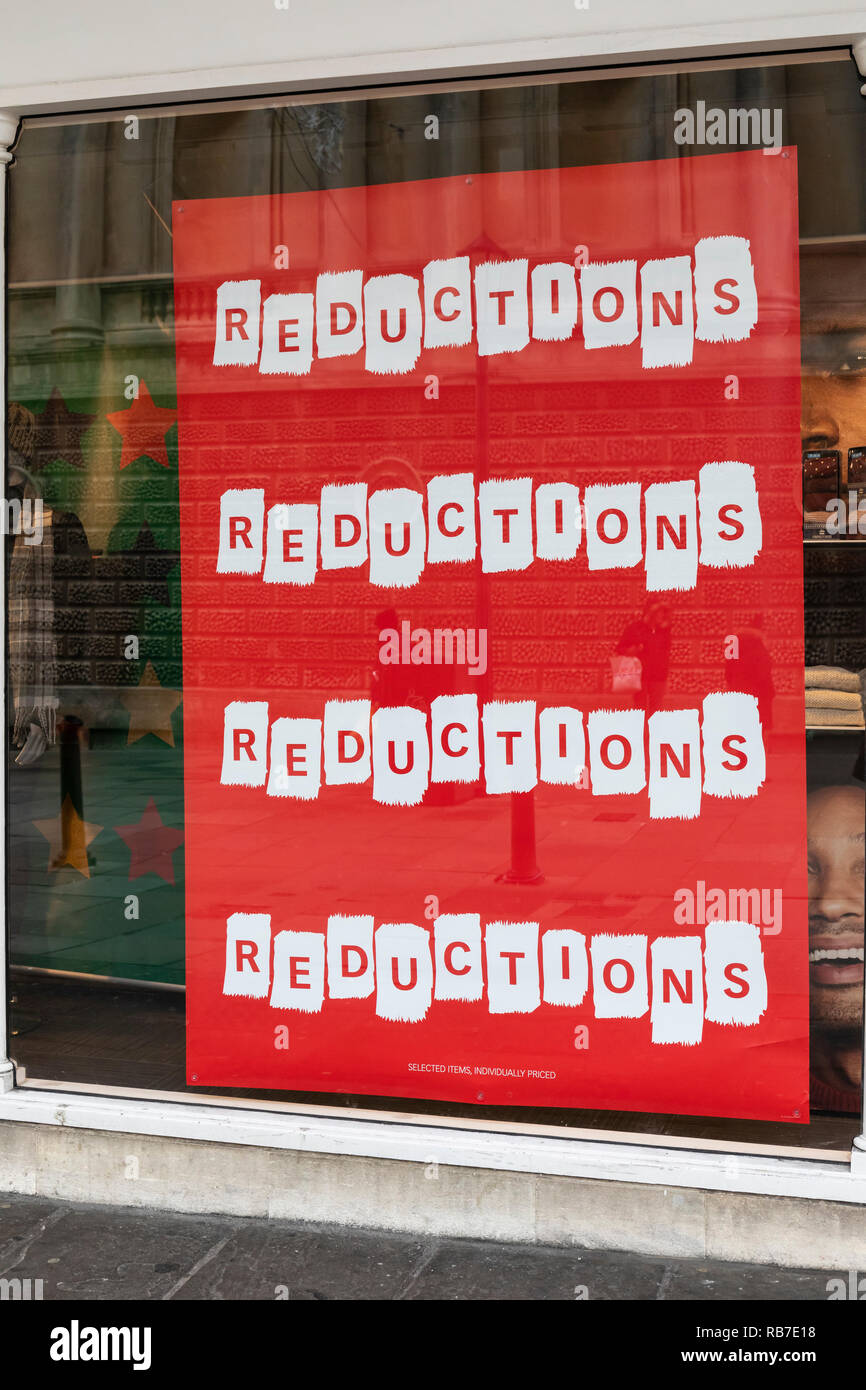Red reductions sign advertising sale in a Primark store, Bath, UK Stock ...