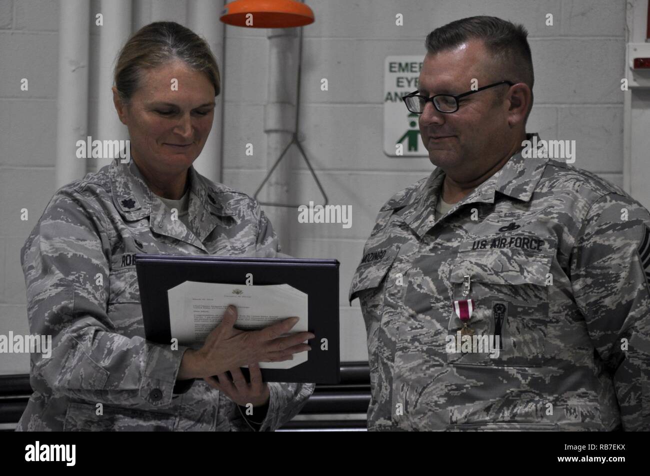 Chief Master Sgt. Mitch Mozingo recieves a letter of appreciation from ...