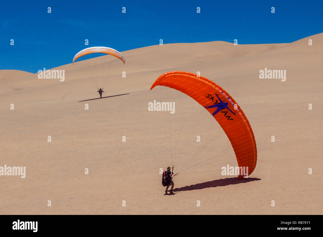 Paragliding over Dunes of Namib Desert, Long Beach, Swakopmund, Namibia ...