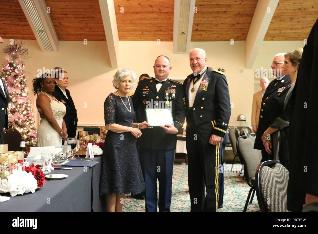 Army Reserve Sgt. 1st Class Anthony Maynard (center), from the 811th ...