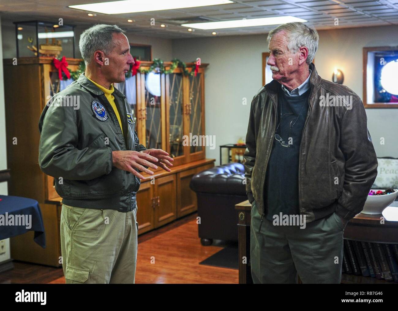 ATLANTIC OCEAN (Dec. 3, 2016) Capt. Tim Kuehhas, left, commanding ...