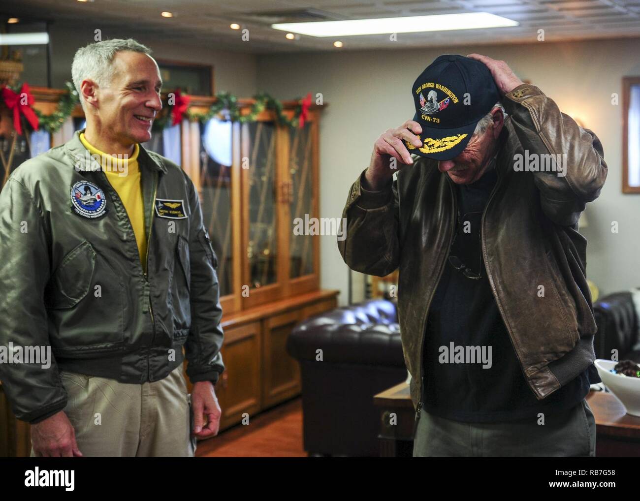ATLANTIC OCEAN (Dec. 3, 2016) Capt. Tim Kuehhas, left, commanding ...