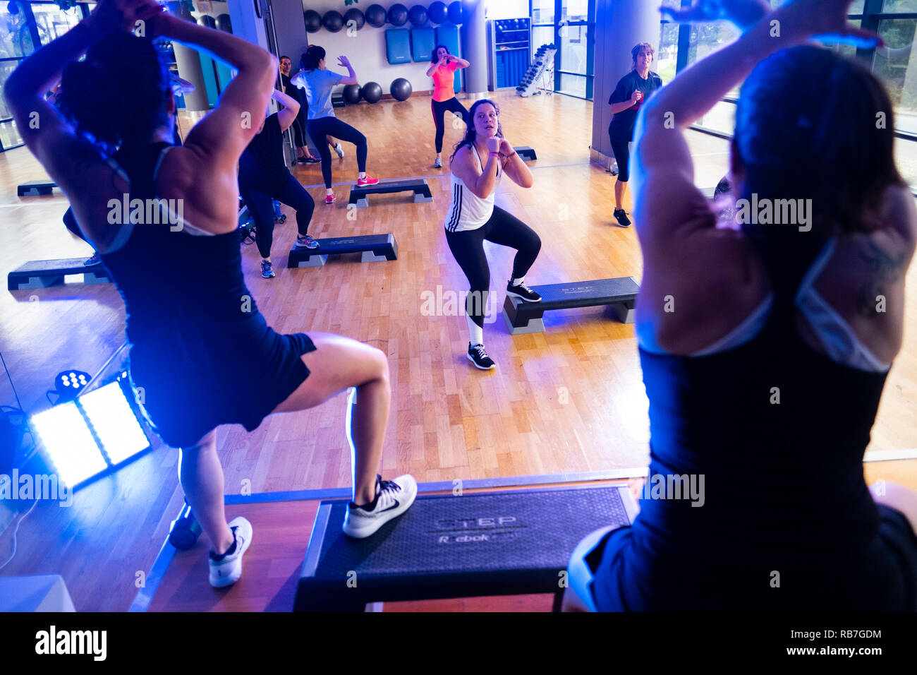 Instructors in step aerobics fitness class at the gym Stock Photo - Alamy