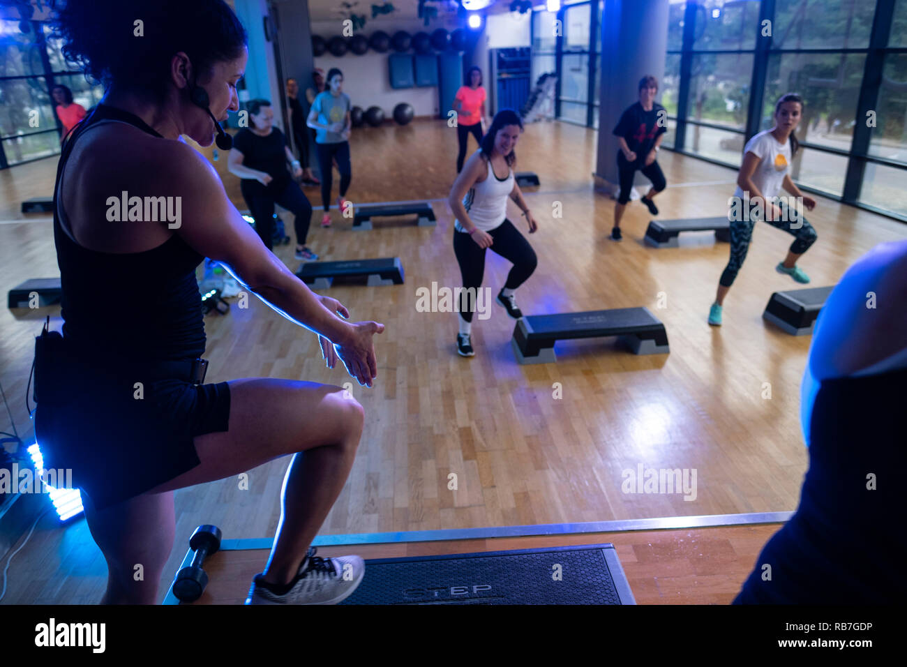 Instructors in step aerobics fitness class at the gym Stock Photo - Alamy