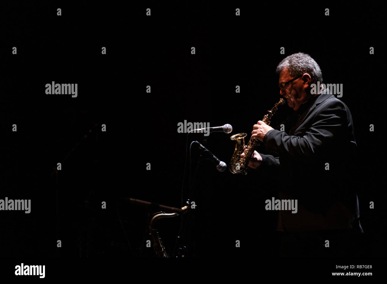 Jazz musician playing a soprano saxophone on stage during a concert ...