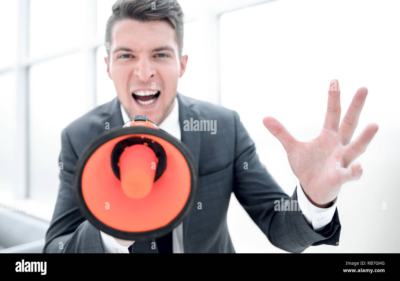 businessman screaming into a megaphone Stock Photo - Alamy