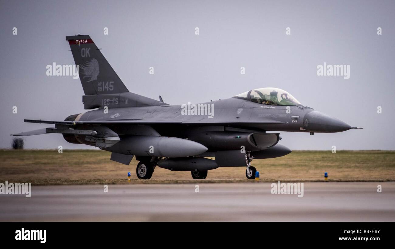 An F-16 Fighting Falcon pilot, 138th Fighter Wing, Tulsa, OK, conducts ...