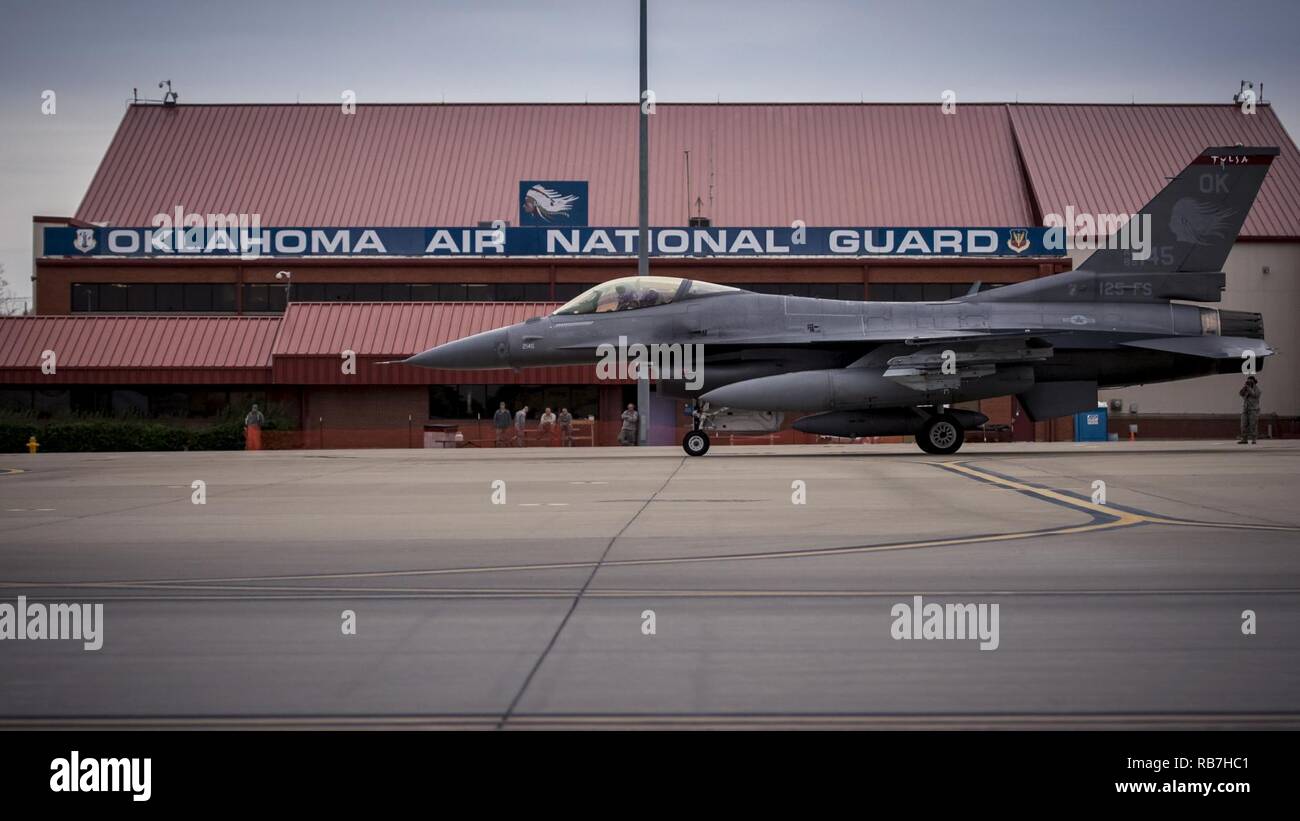 An F-16 Fighting Falcon pilot, 138th Fighter Wing, Tulsa, OK, conducts ...
