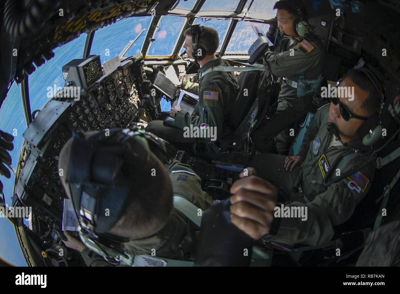 The crew of a C-130 Hercules assigned to the 36th Airlift Squadron work ...
