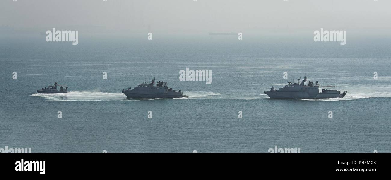 A Sea Ark patrol boat, center, leads a Mark VI patrol boat, left, and a ...