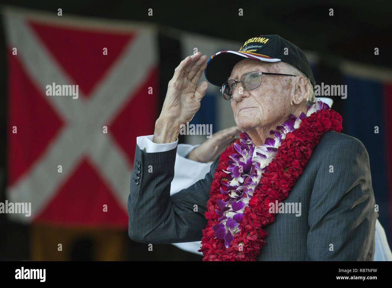 Donald Stratton, a pearl harbor survivor, renders a salute as the USS ...