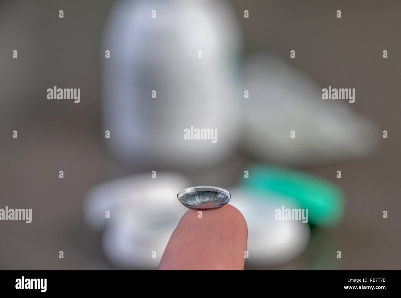 Soft eye lens on finger on accessories background isolated Stock Photo ...