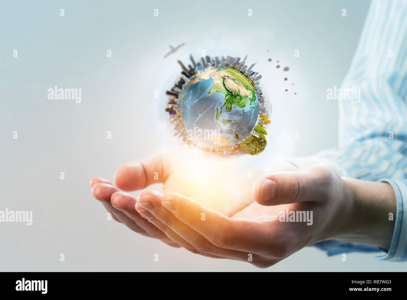 Whole world in hands Stock Photo - Alamy