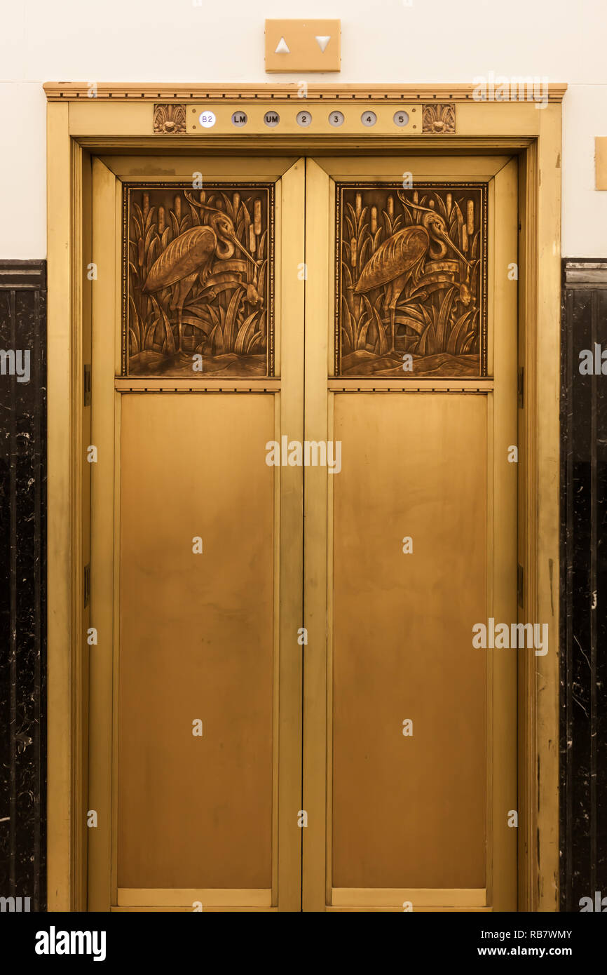Brass elevator doors in a heritage building Stock Photo - Alamy