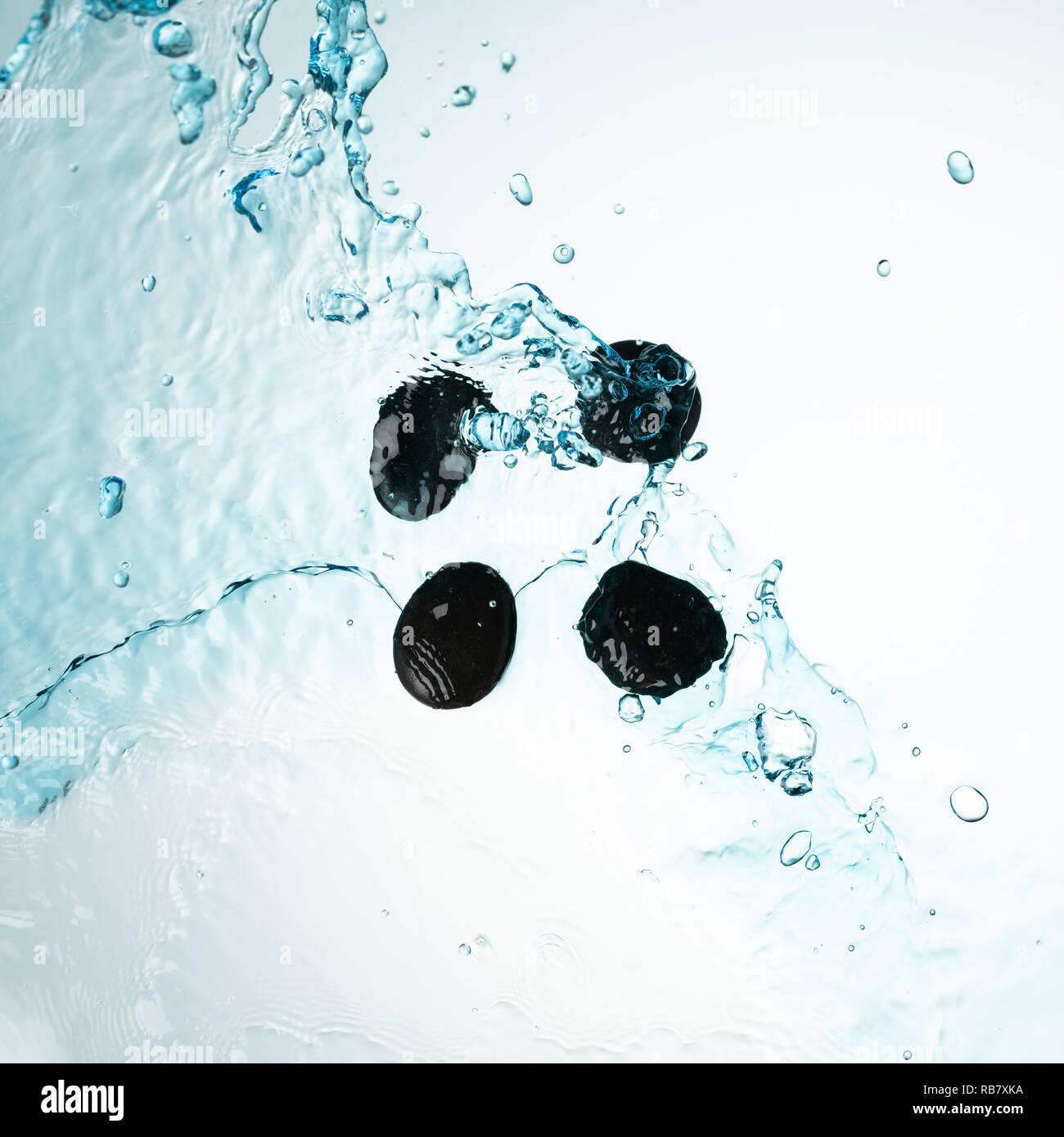 Water splash and zen rocks overhead view Stock Photo - Alamy