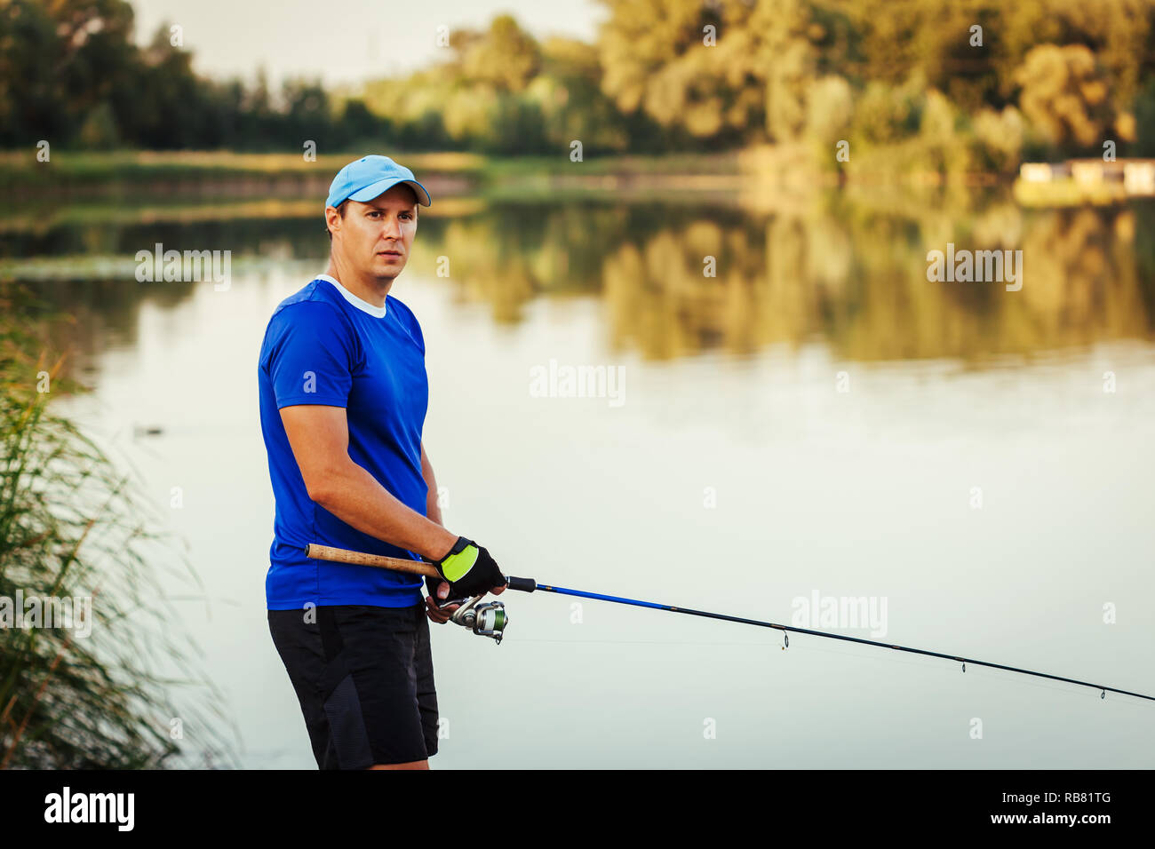 Sad Man Fishing Rod High Resolution Stock Photography and Images - Alamy