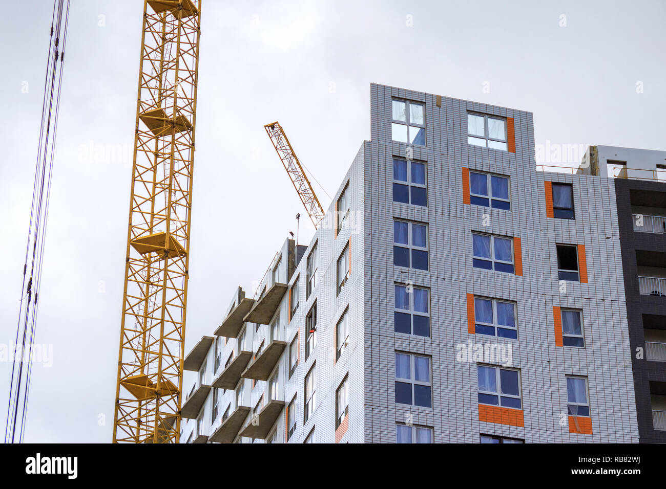 Cranes and building construction Stock Photo - Alamy