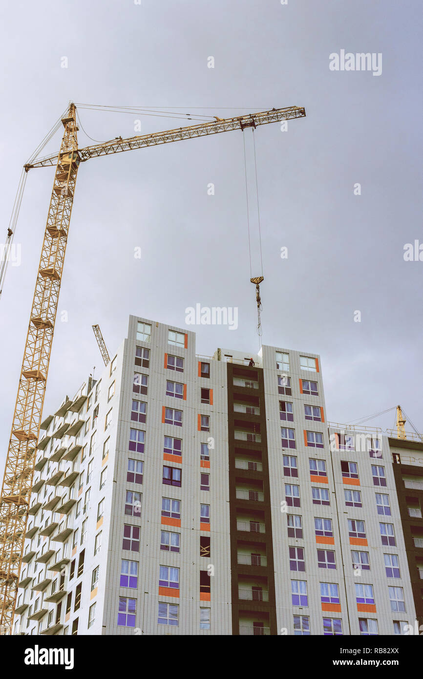 Crane and building construction Stock Photo - Alamy