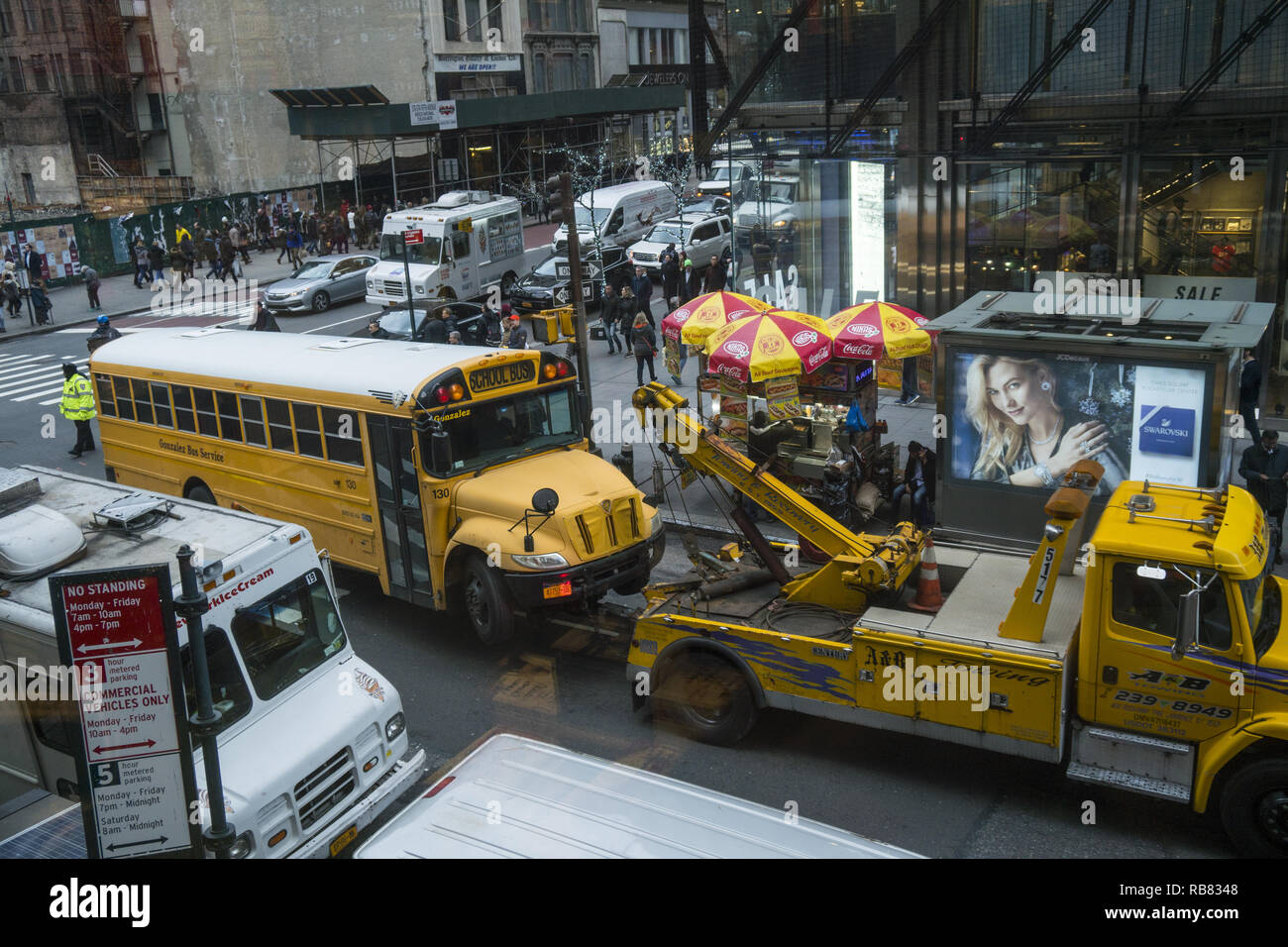 Bus being towed nyc hi-res stock photography and images - Alamy