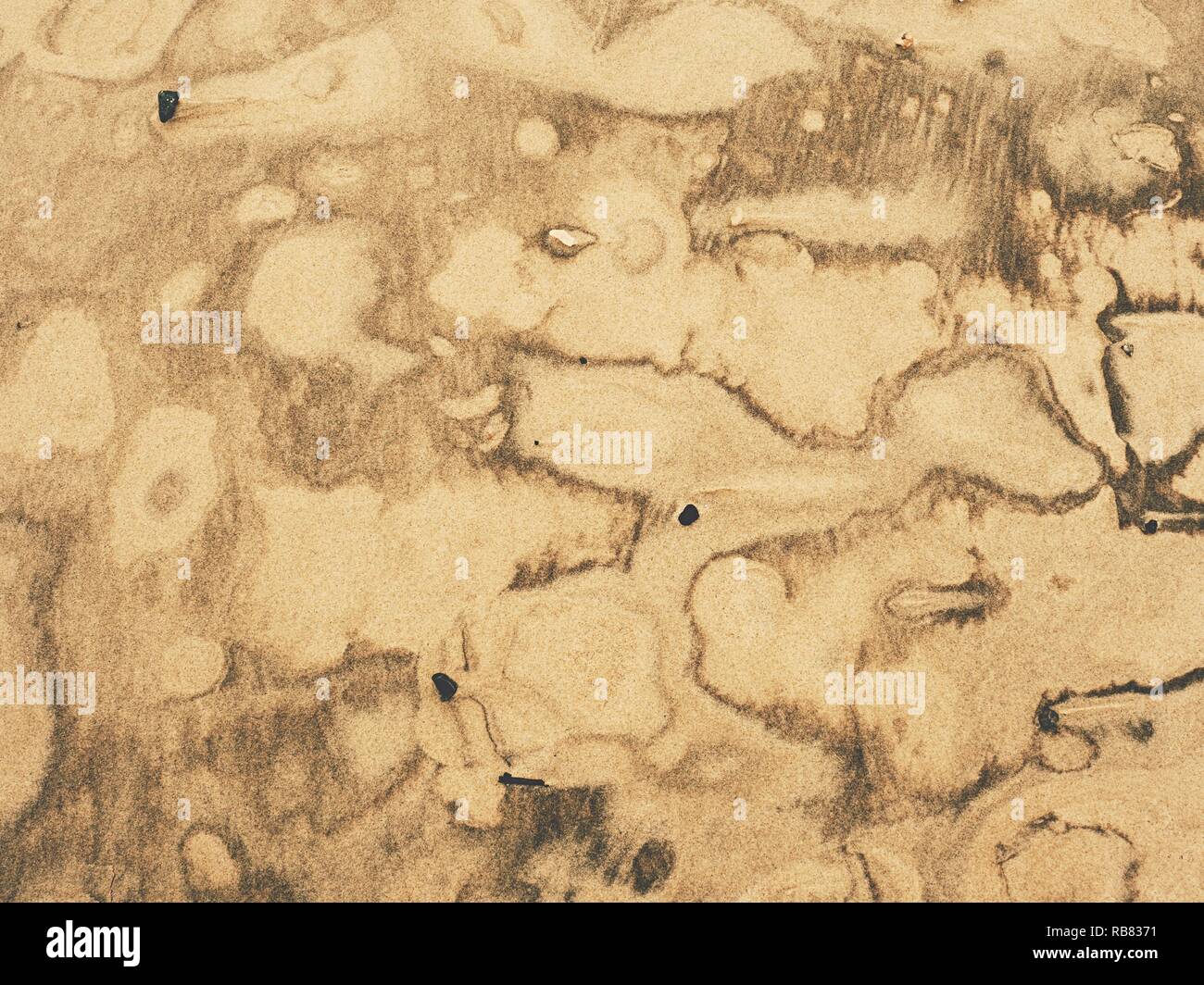 Desert sand pattern with beautiful shapes from crushed shells and ...