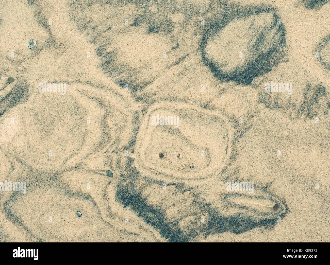 Desert sand pattern with beautiful shapes from crushed shells and ...