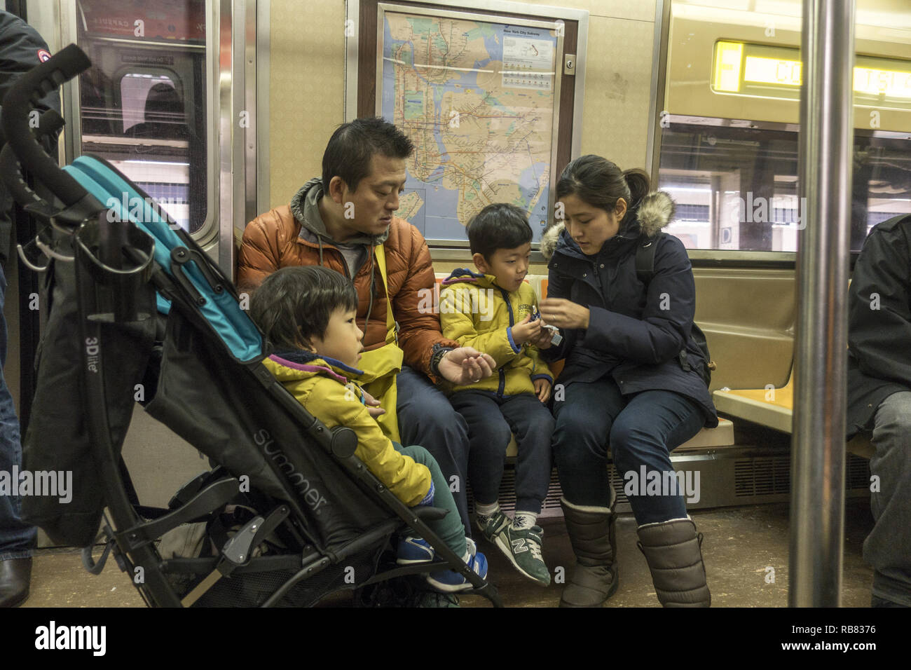 Children riding new york subway hi-res stock photography and images - Alamy