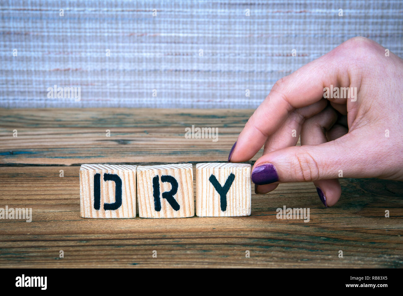 Dry. Wooden letters on the office desk Stock Photo - Alamy