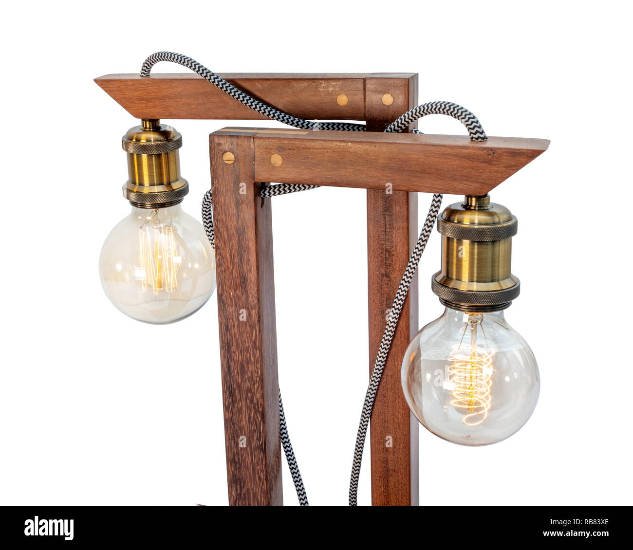 Rustic wood table lamp with small white lampshade isolated on white ...