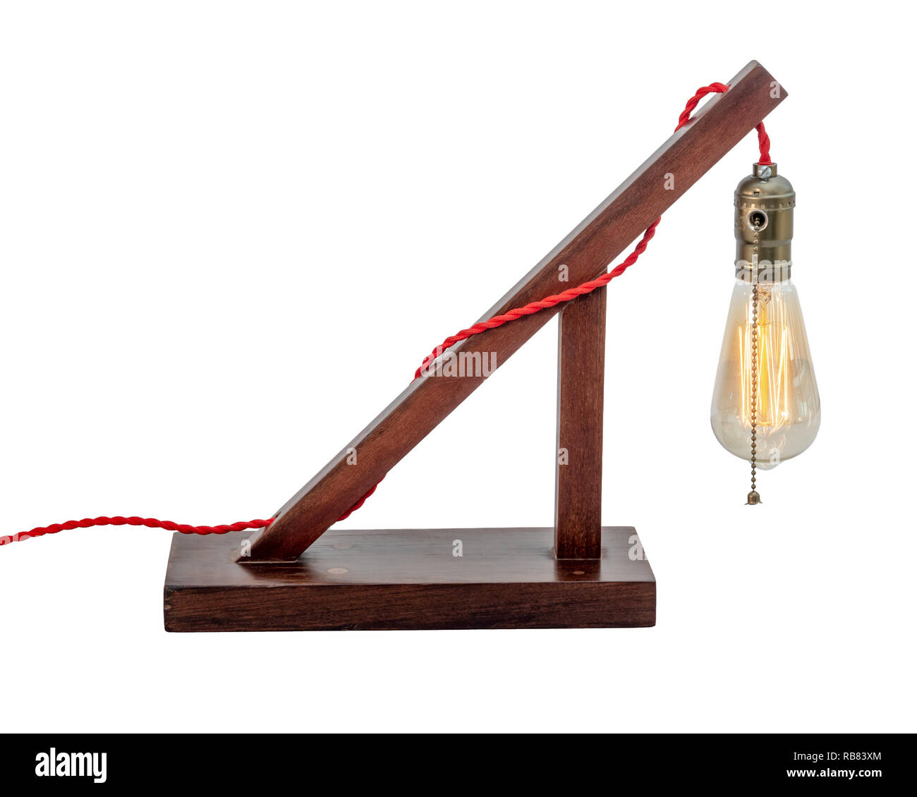 Rustic wood table lamp with small white lampshade isolated on white ...