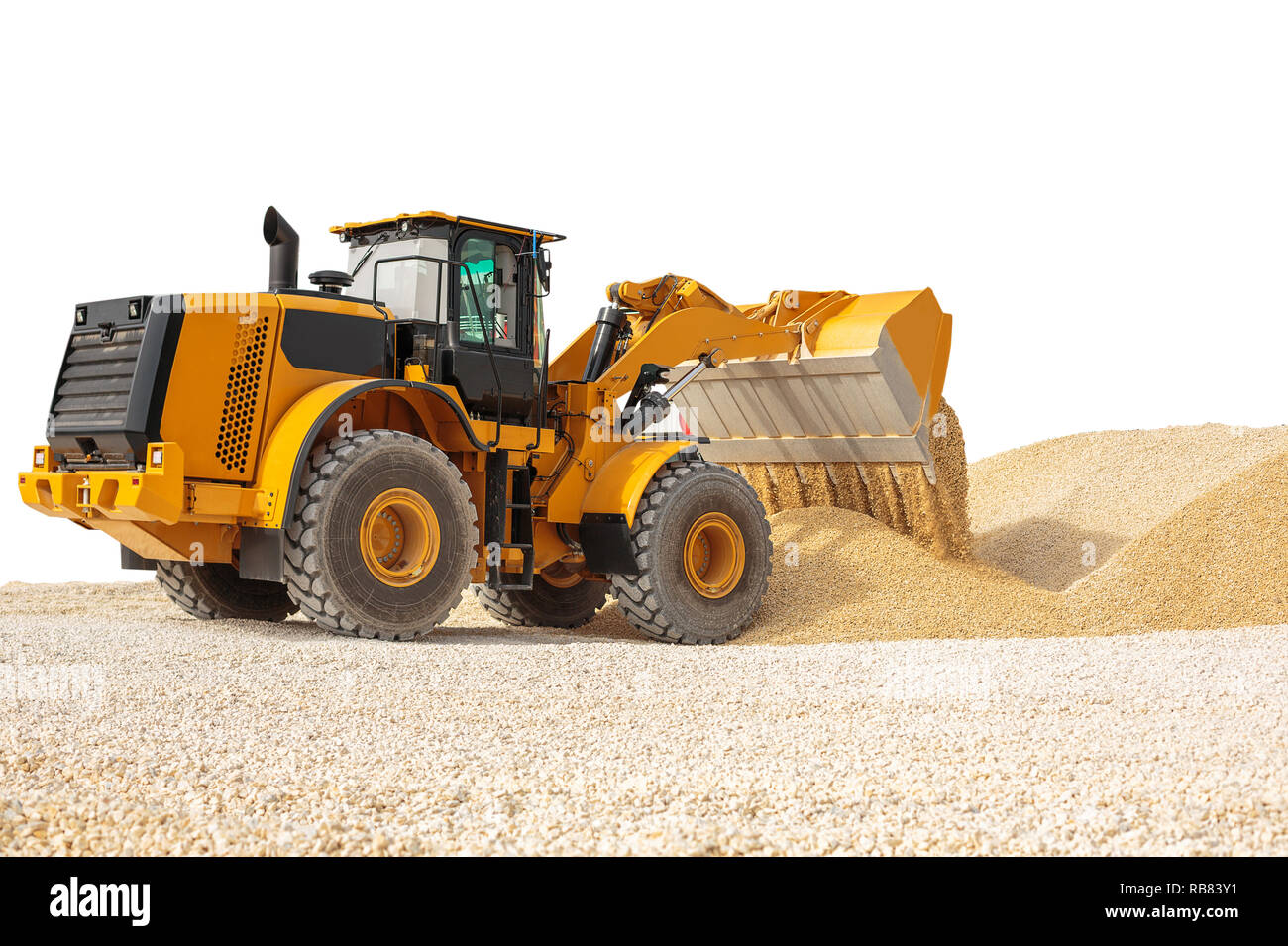 Working bulldozer on a building site isolated with clipping path ...
