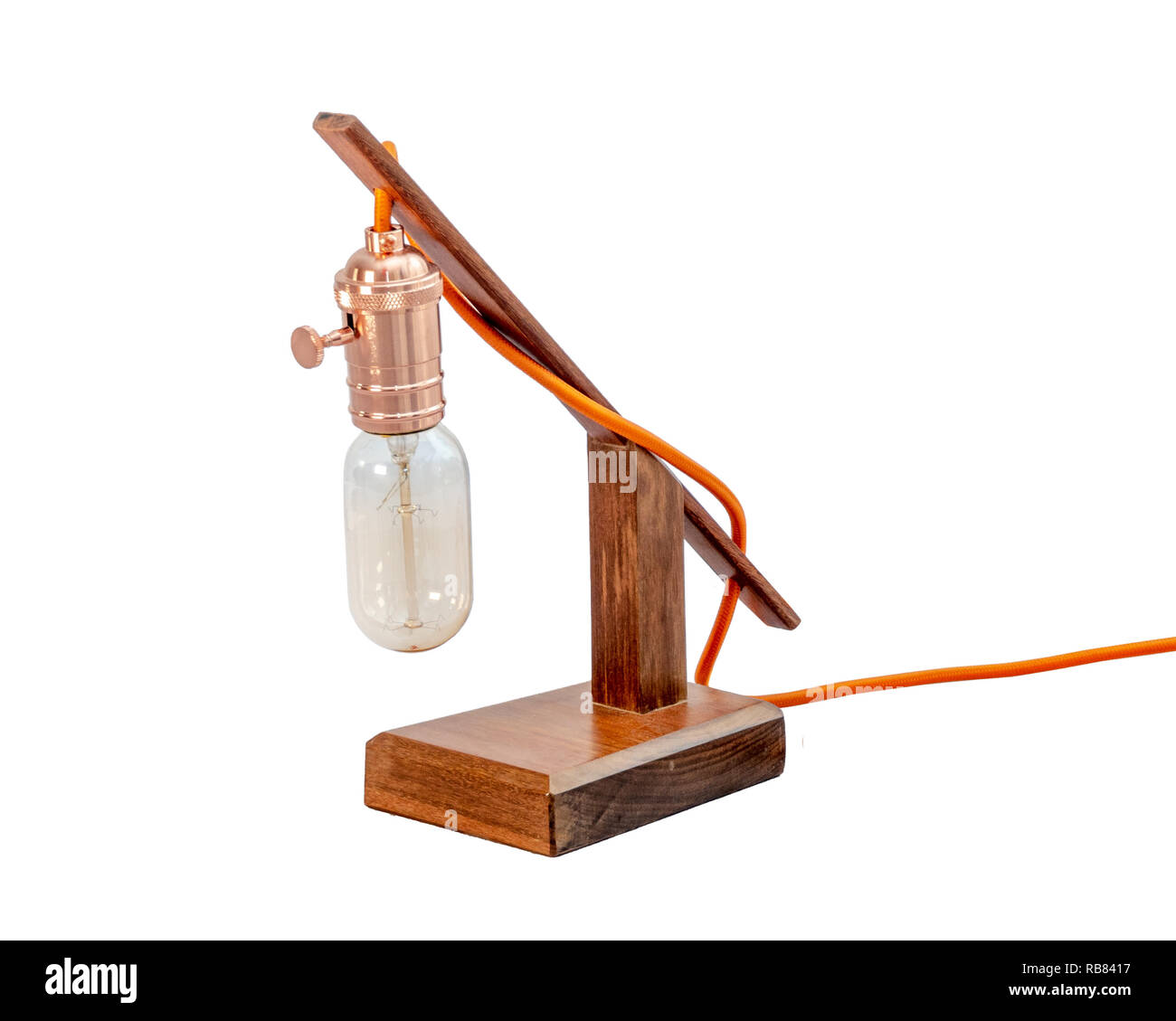 Rustic wood table lamp with small white lampshade isolated on white ...