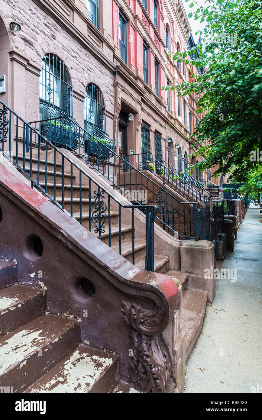 Old typical houses in the Harlem neighborhood in Manhattan, New York ...