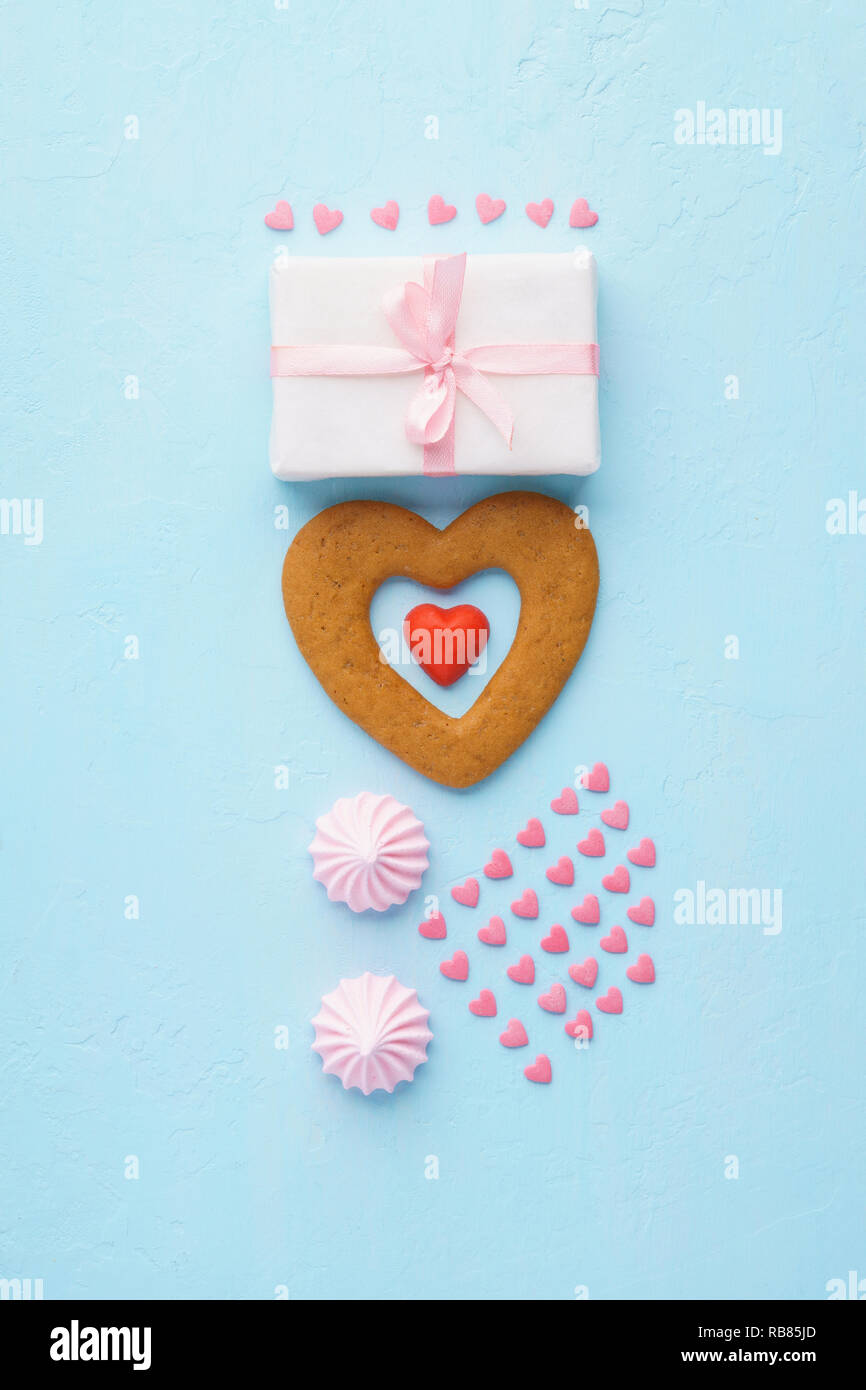 Valentine's Day creative layout design. Gift box with ribbon, heart ...