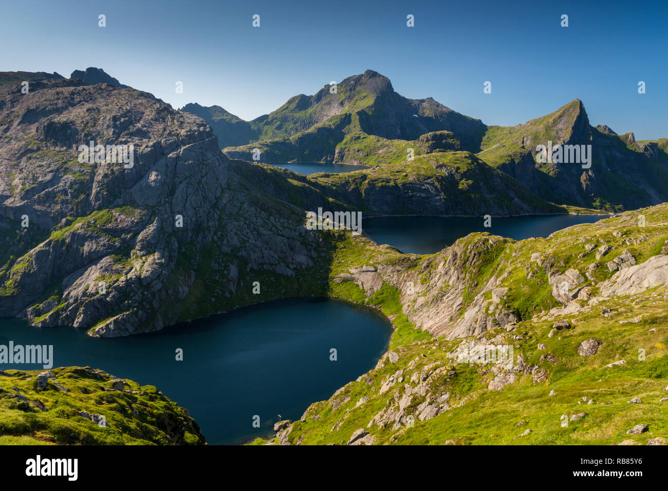 View of the mountains, lakes and fjords near Sørvågen on Moskenesøya ...